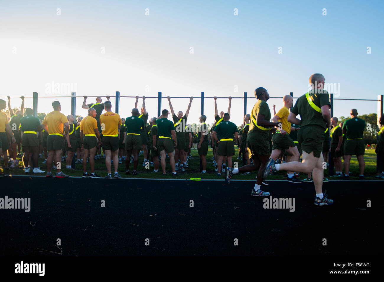 Recruits do pullups and run 1.5 miles during an initial strength test ...
