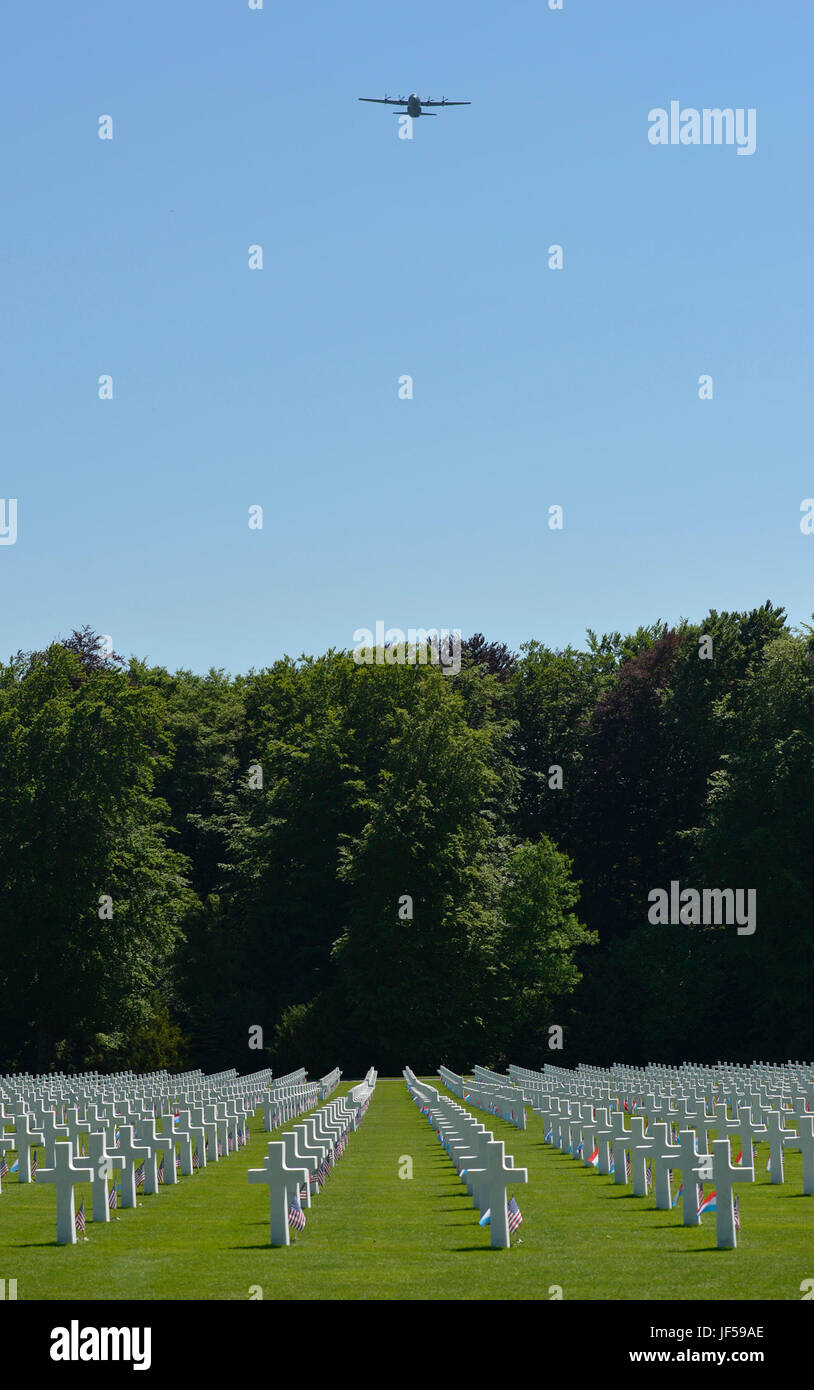 A C-130J Super Hercules aircraft performs a flyover during the Memorial ...