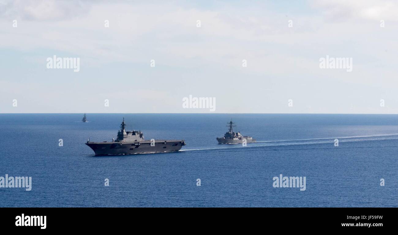 The Arleigh Burke-class destroyer USS Dewey (DDG 105) transits the ...