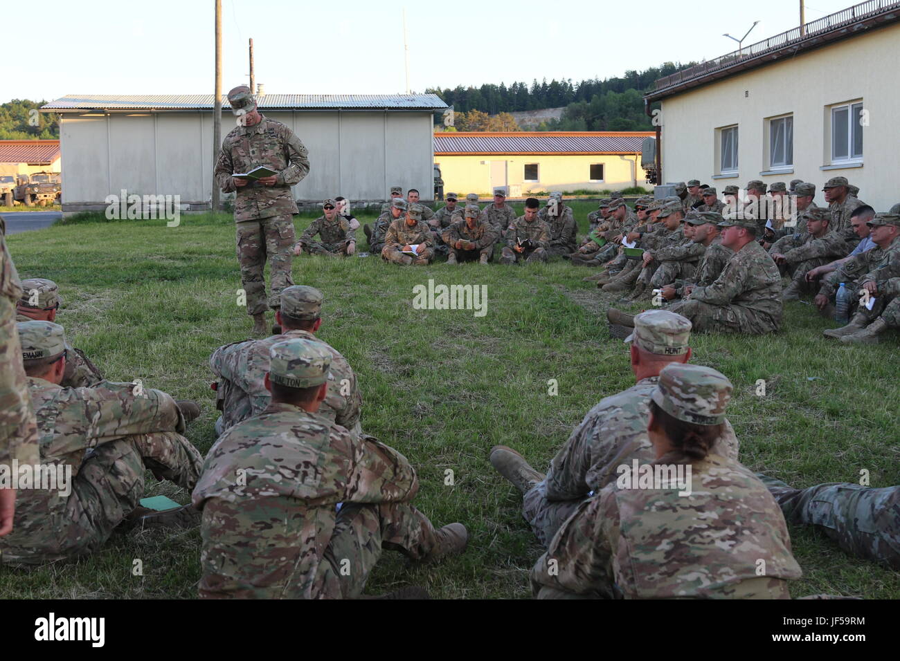 Command Sgt. Maj. Walter Stevens, center, the senior enlisted advisor ...