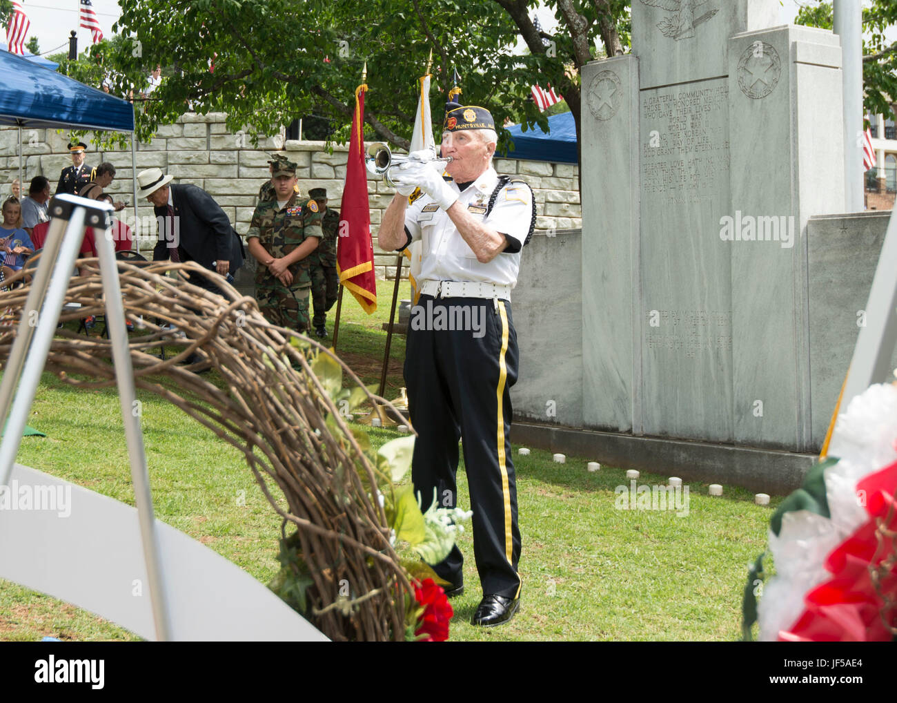 World War II veteran and bugler retired Col. Mike Vaccaro performs at ...