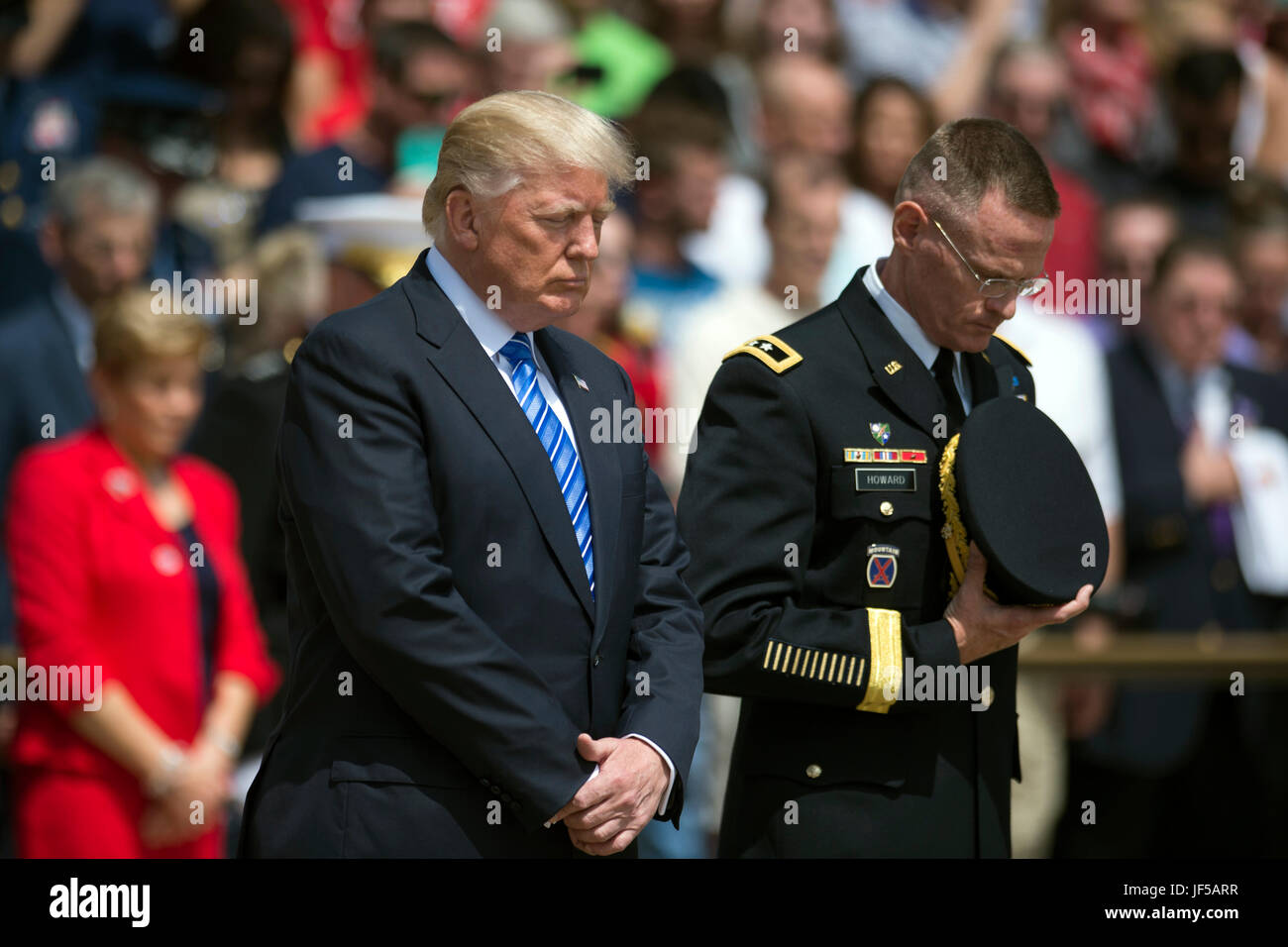President Donald J. Trump and Maj. Gen. Michael L. Howard bow their ...