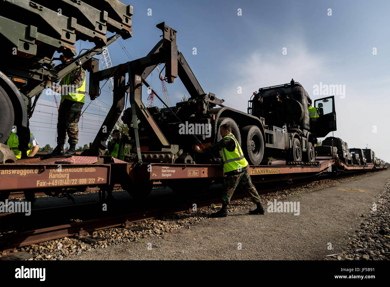 Dutch Marines in cooperation of MOVECON units load their equipment on ...