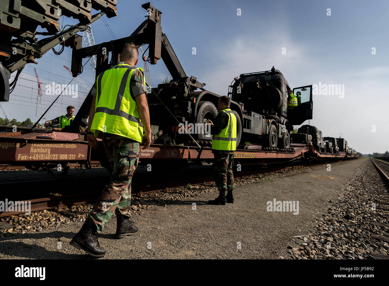 Dutch Marines in cooperation of MOVECON units load their equipment on ...