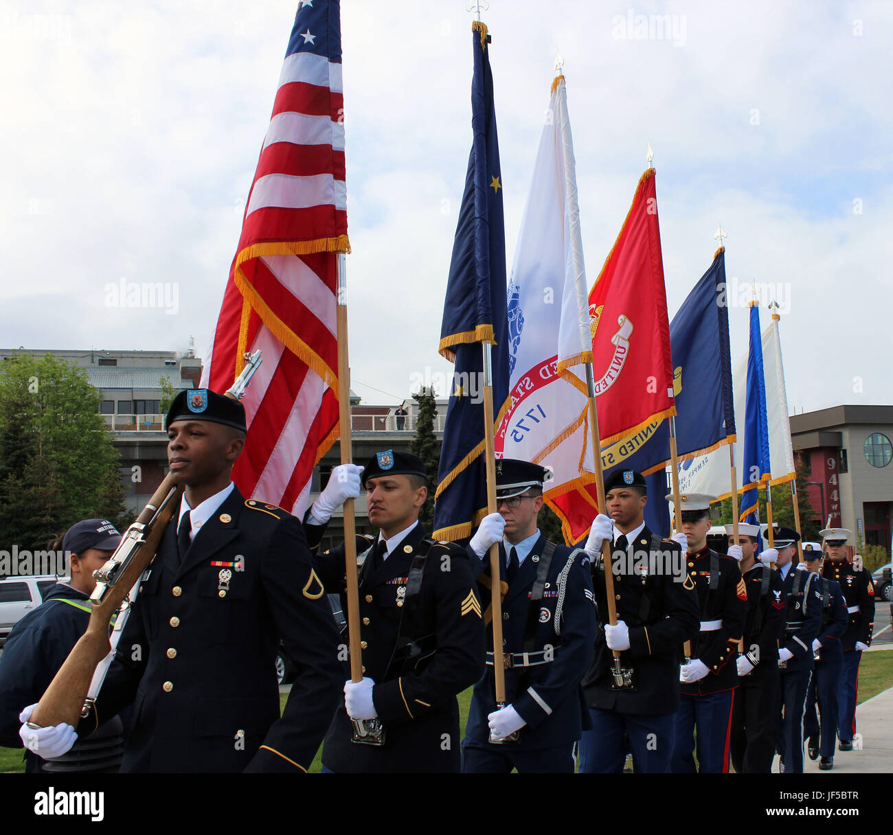 Members of a joint color guard from Joint Base Elmendorf-Richardson ...