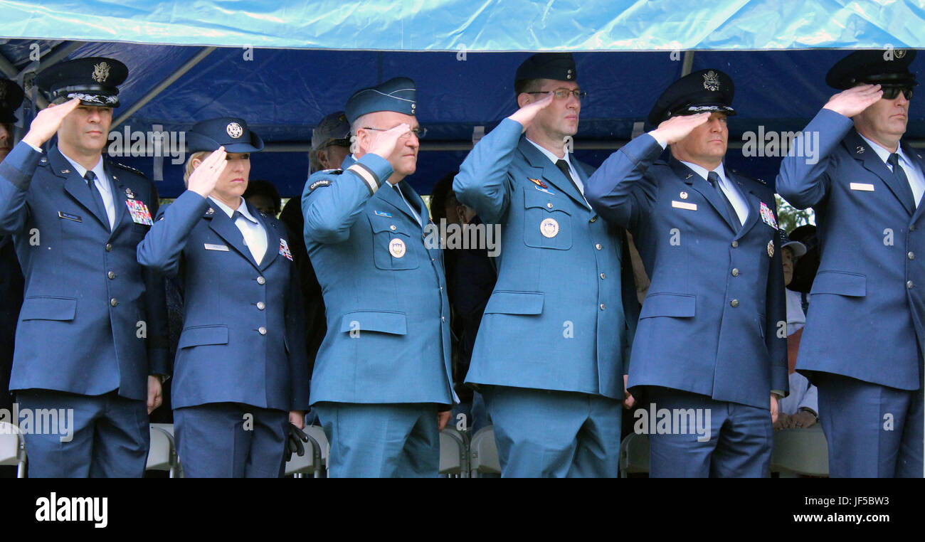 Key leaders from the American and Canadian air force salute as the ...