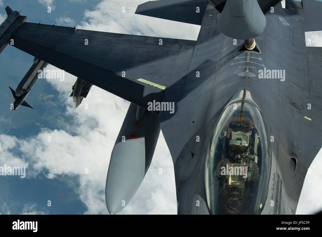 A U.S. Air Force F-16 Fighting Falcon receives fuel during air-to-air ...