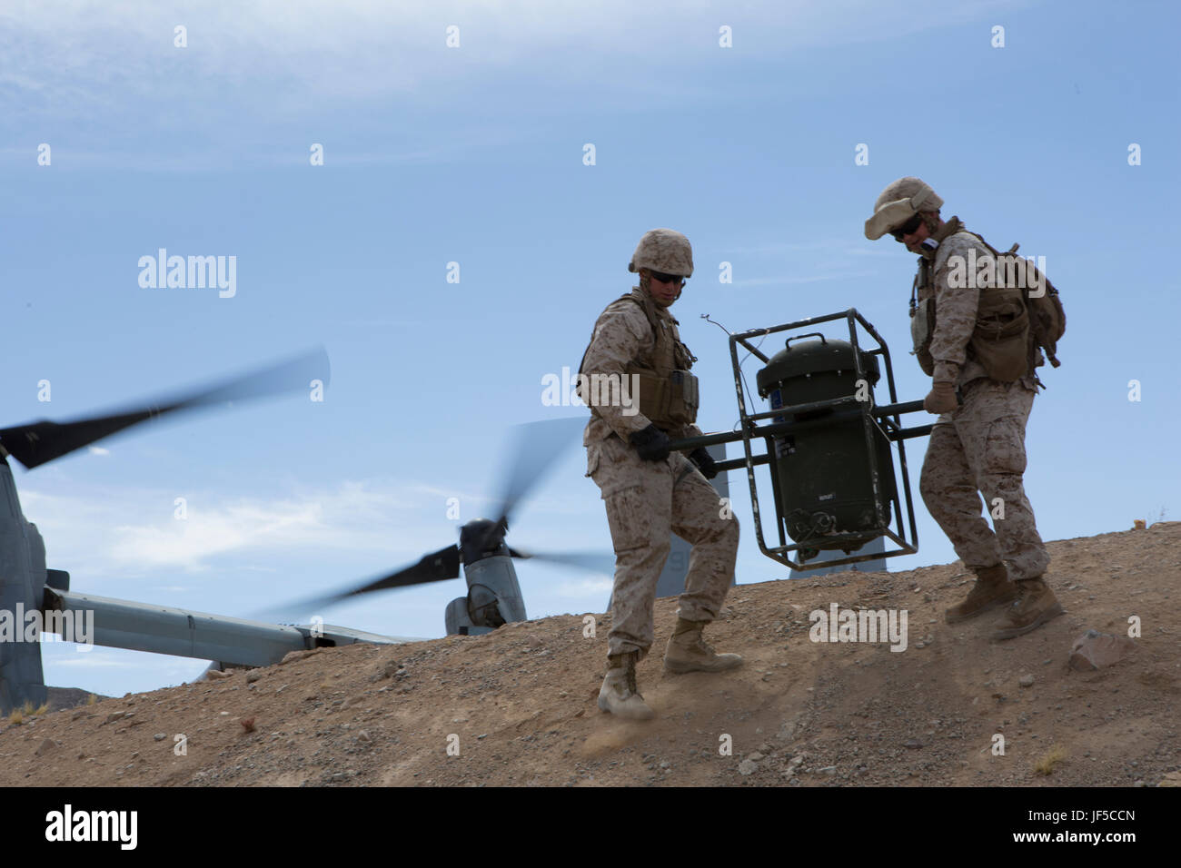Marines with Marine Medium Tiltrotor Squadron (VMM) 363 conduct an air ...