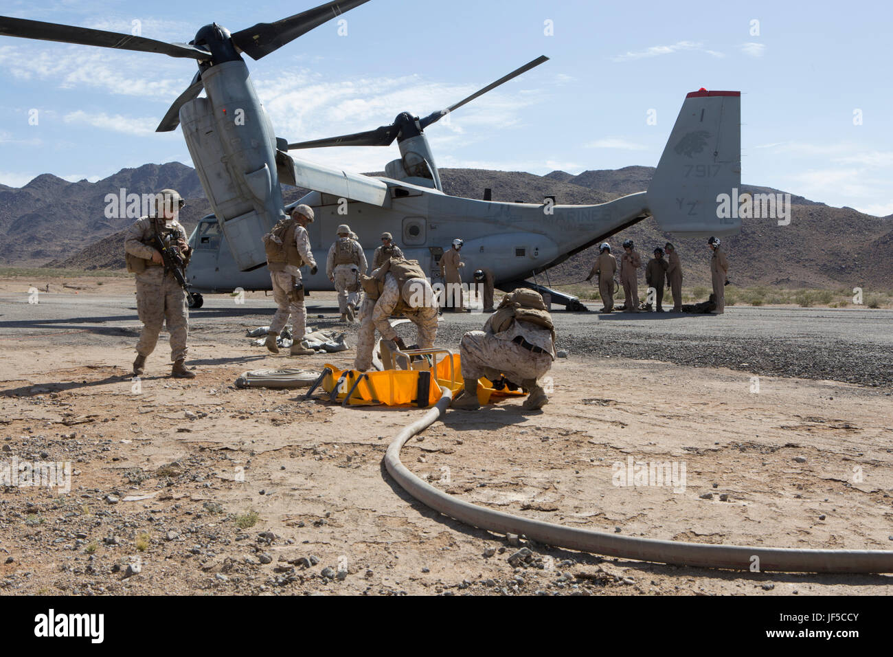 Marines with Marine Medium Tiltrotor Squadron (VMM) 363 conduct an air ...