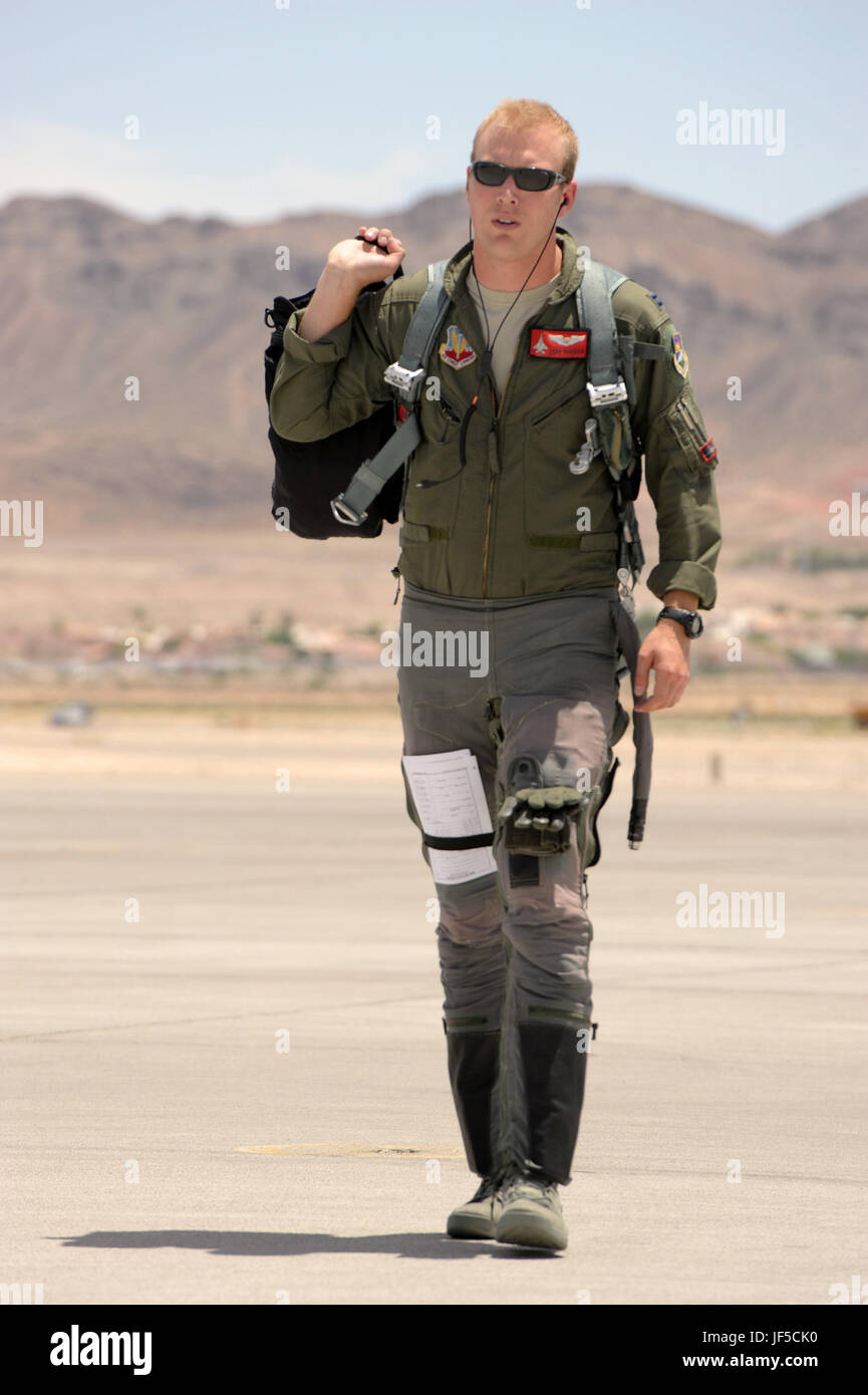 Oregon Air National Guard Capt. Joshua Pfeifer walks from the ...