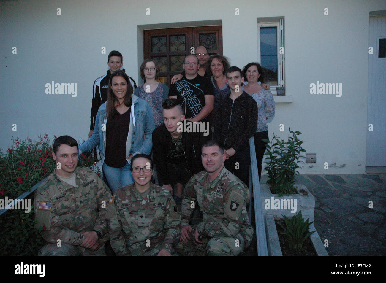 Soldiers from the 29th Infantry Division pose for a picture with their ...