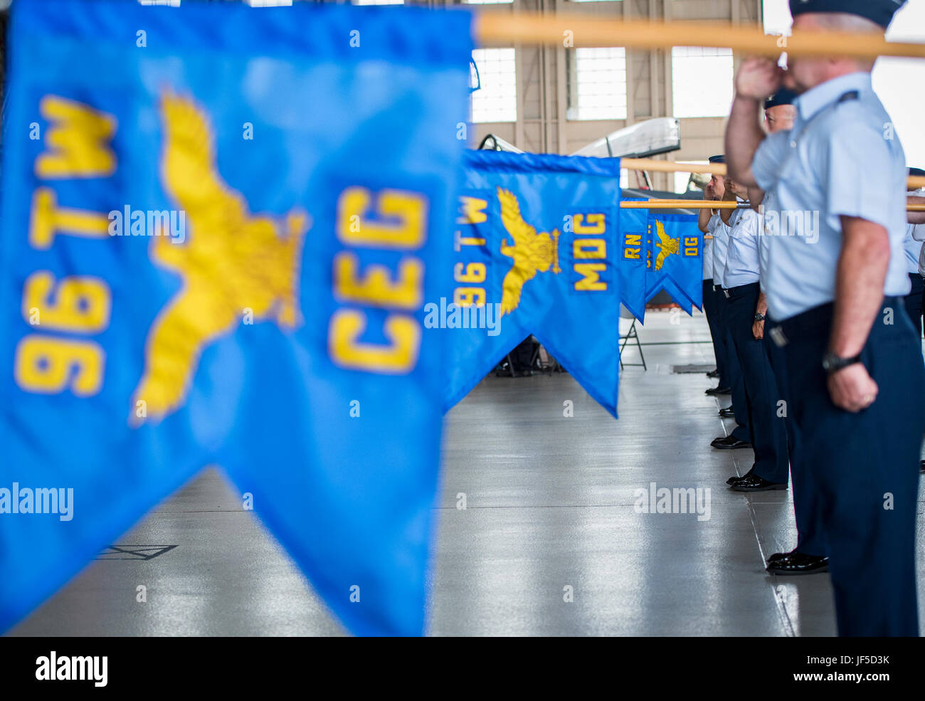 The 96th Test Wing’s guidons are held at present arms during the wing’s ...