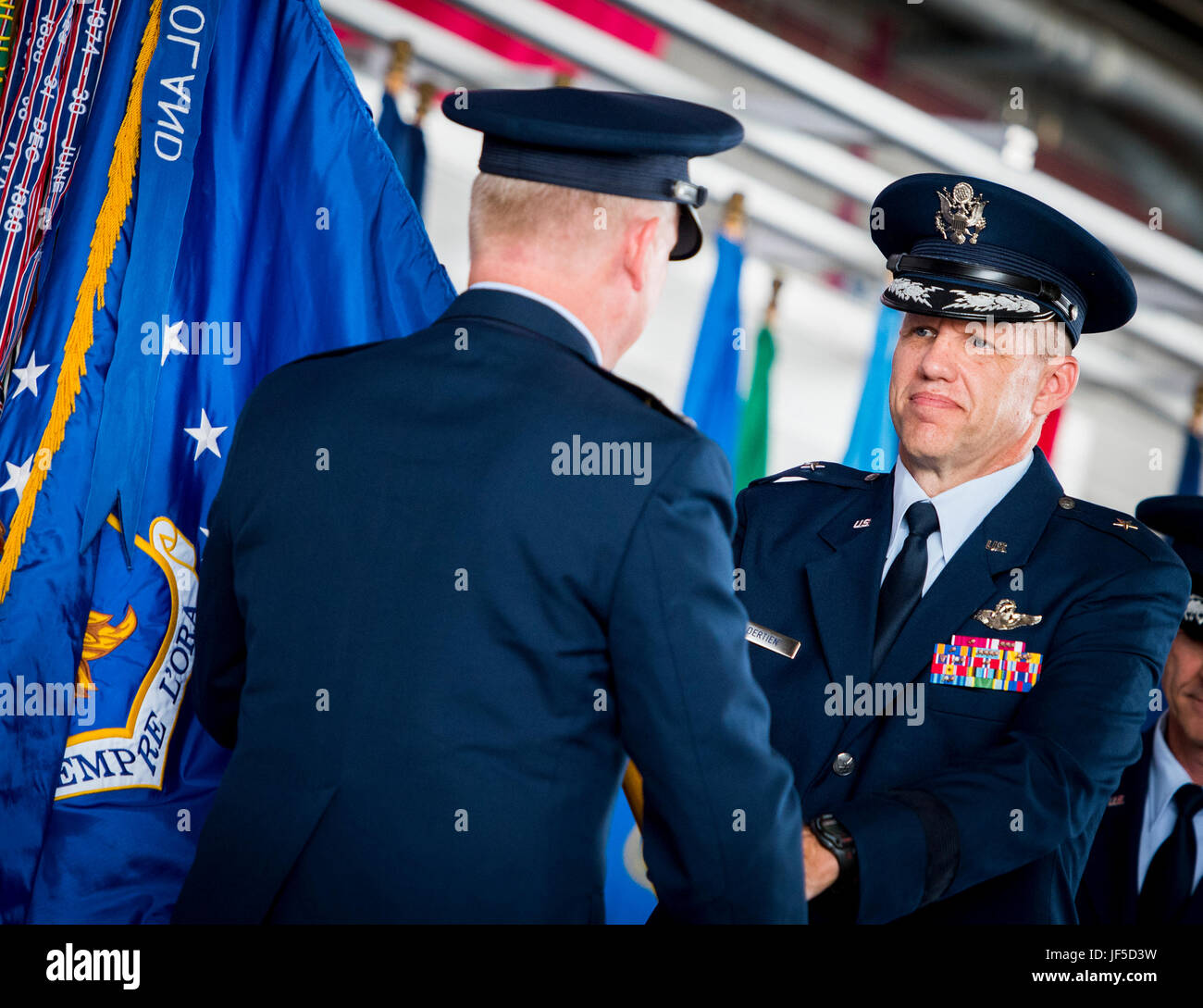 Brig. Gen. Evan Dertien accepts the 96th Test Wing guidon from Maj. Gen ...