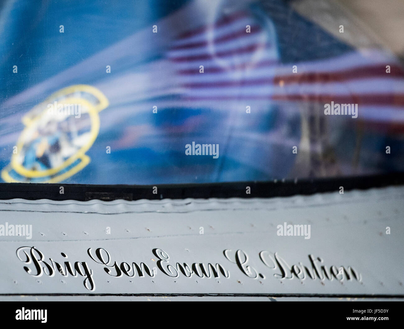 New commander, Brig. Gen. Evan Dertien, has his name placed on an F-16 ...