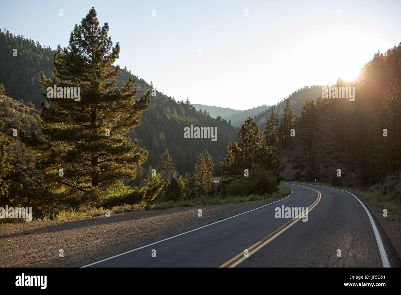 Sunlight bursts from behind hi-res stock photography and images - Alamy