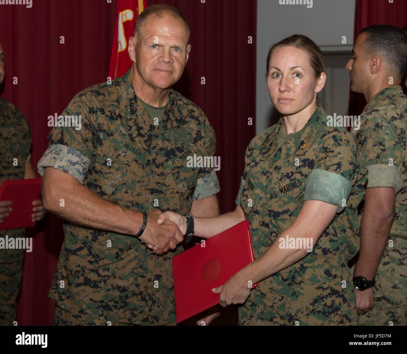 Commandant of the Marine Corps Gen. Robert B. Neller, left, shakes ...