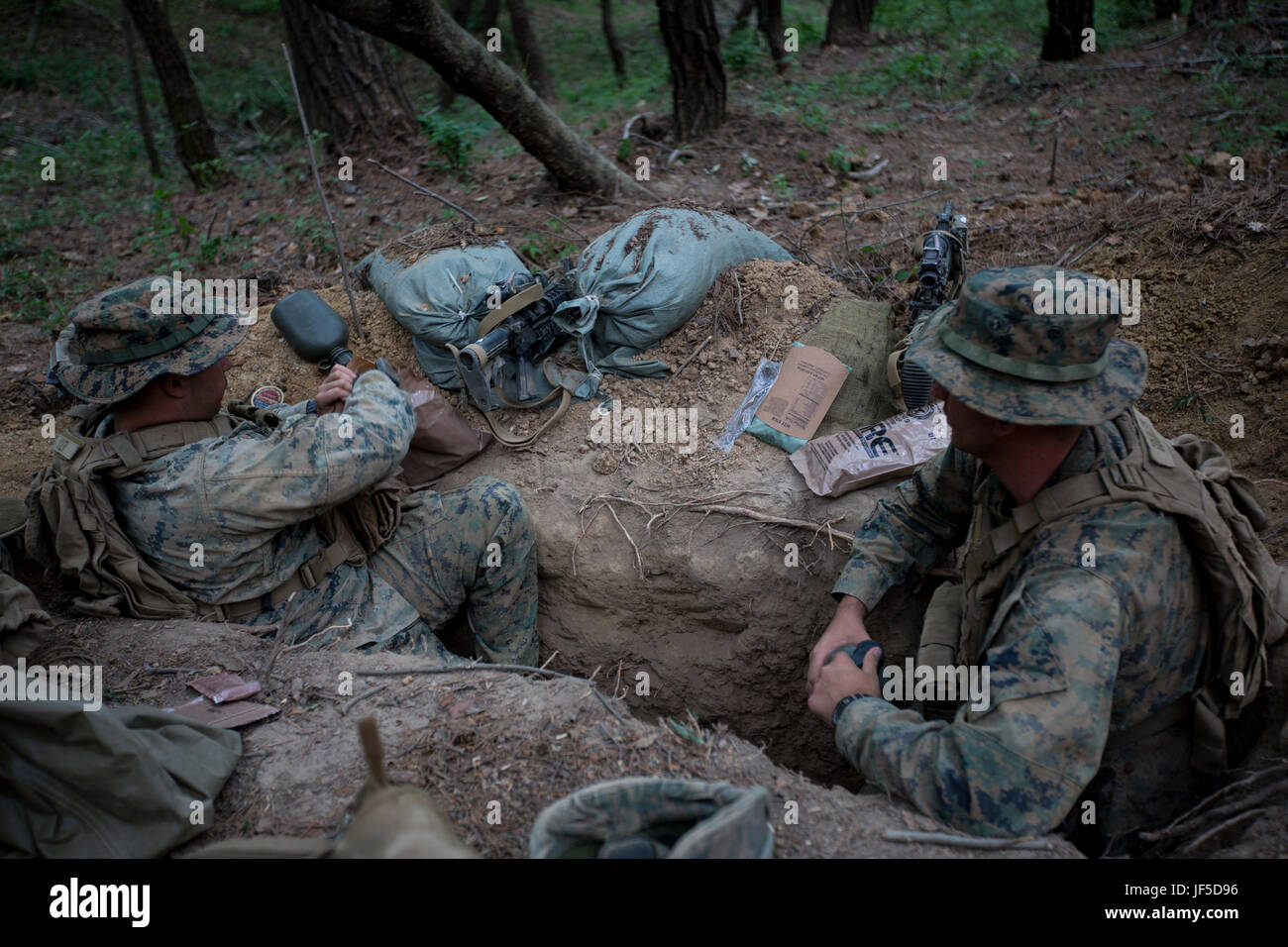 U.S. Marines and Sailors assigned to India Company, 3rd Battalion, 8th ...
