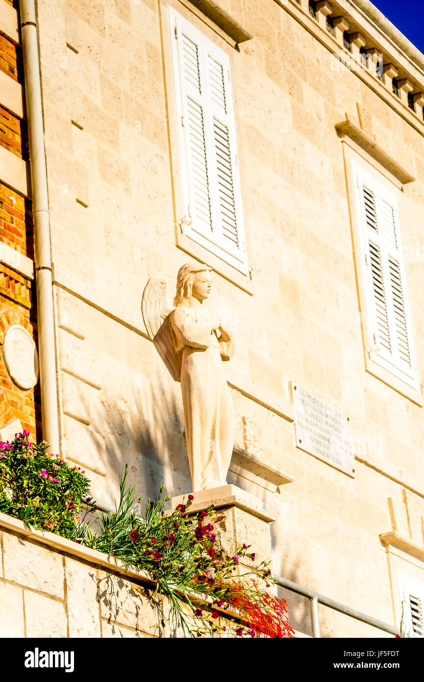 Beautiful houses with statues line Plaza Ispod Duvana and the stunning ...