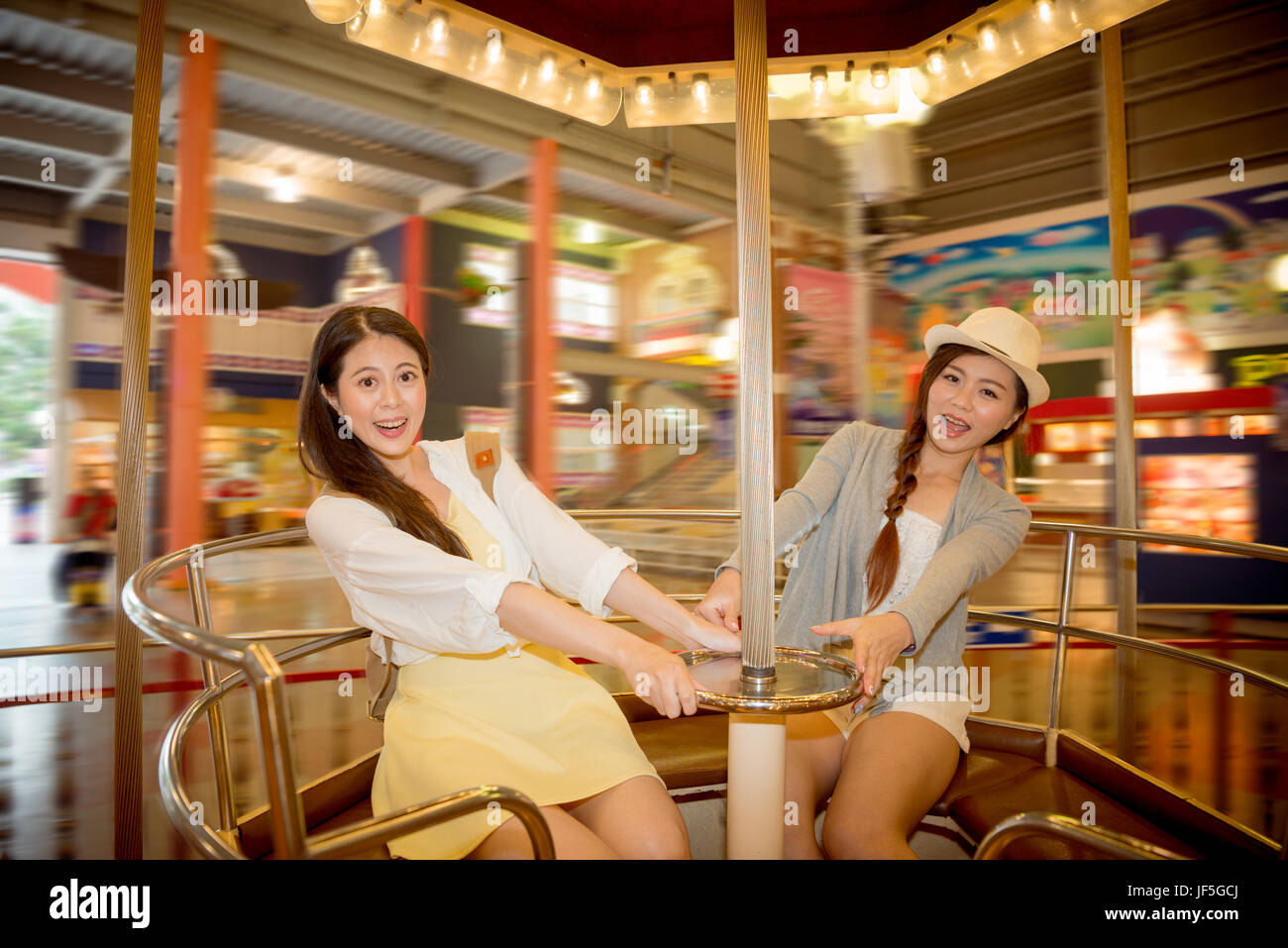 asian chinese students going to the amusement park to enjoying leisure ...