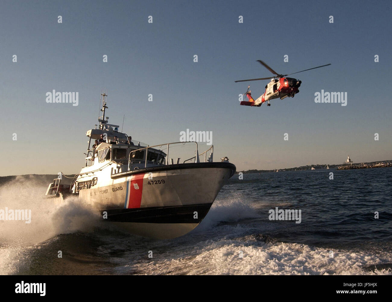 BOSTON (Aug. 25, 2005) Two Massachusetts based Coast Guard assets, a 47 ...