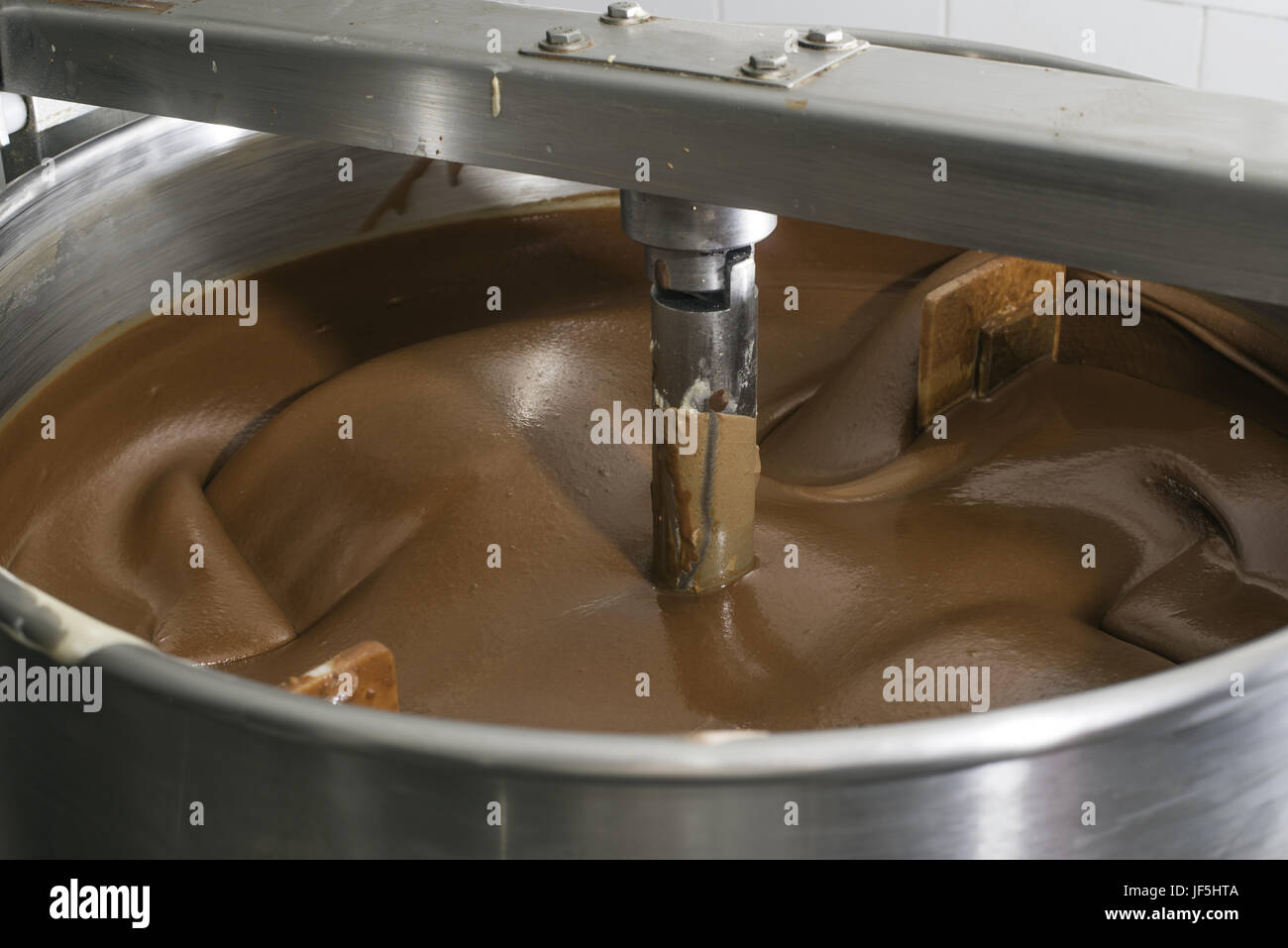 Machine for mixing chocolate Stock Photo - Alamy