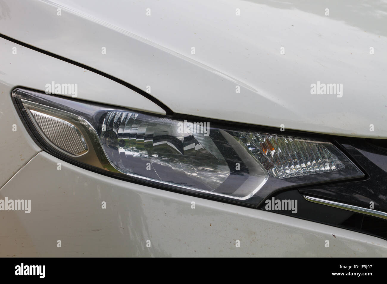 Close up headlights of car background and texture Stock Photo - Alamy