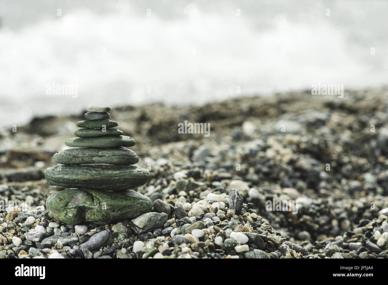 Stacked sea stones Stock Photo - Alamy