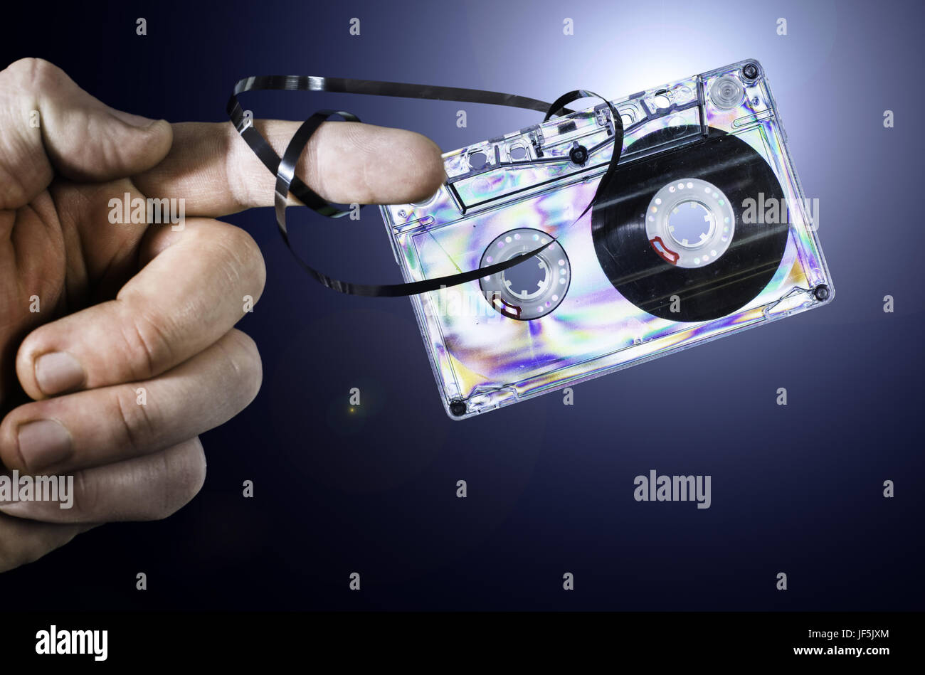 Hand holding vintage cassette tape Stock Photo - Alamy