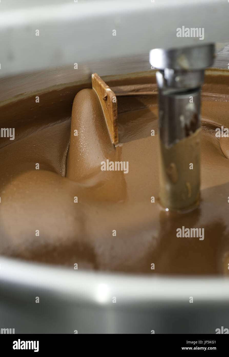 Chocolate factory mixing hi-res stock photography and images - Alamy