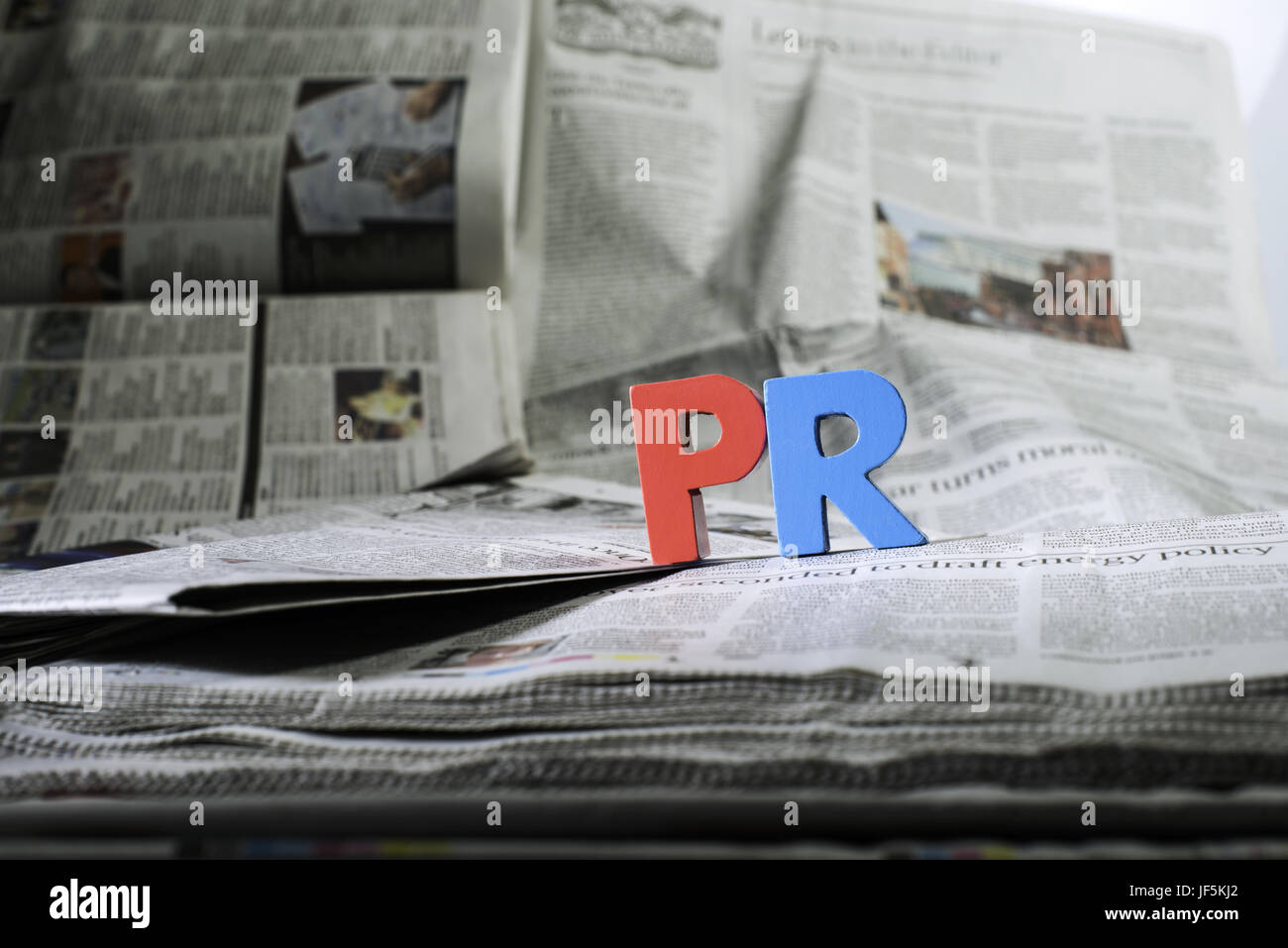 Word PR on newspaper Stock Photo - Alamy