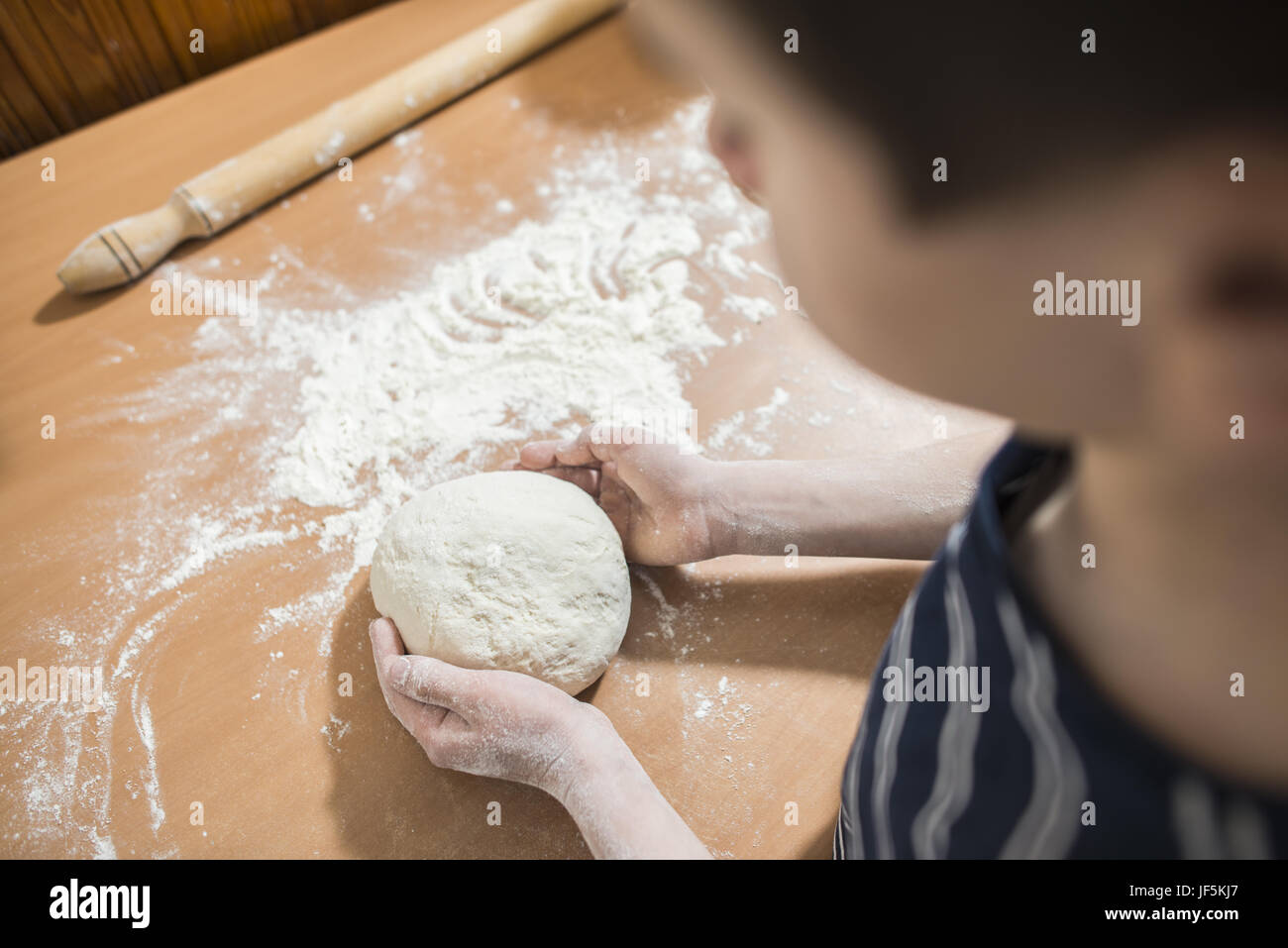 Making bread in a kitchen Stock Photo - Alamy