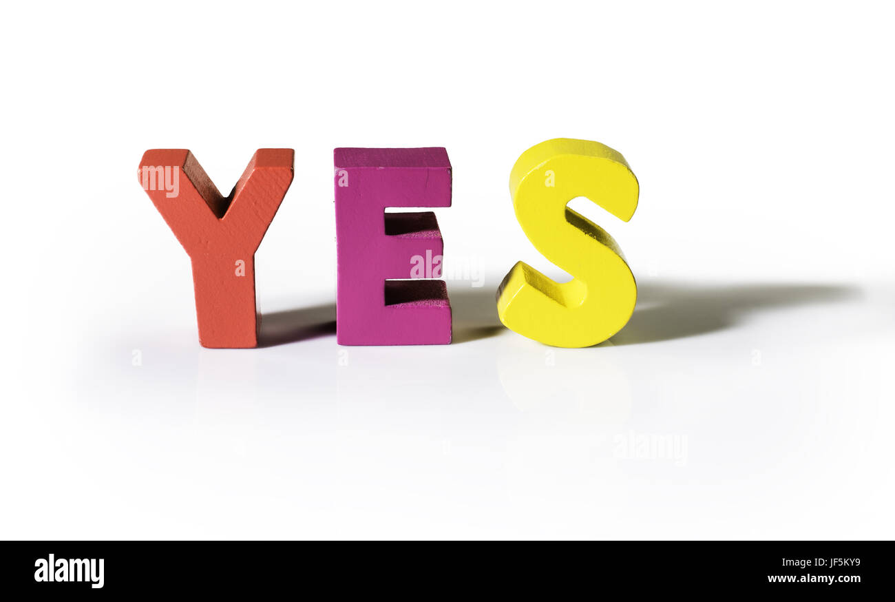 Multicolored word yes made of wood Stock Photo - Alamy