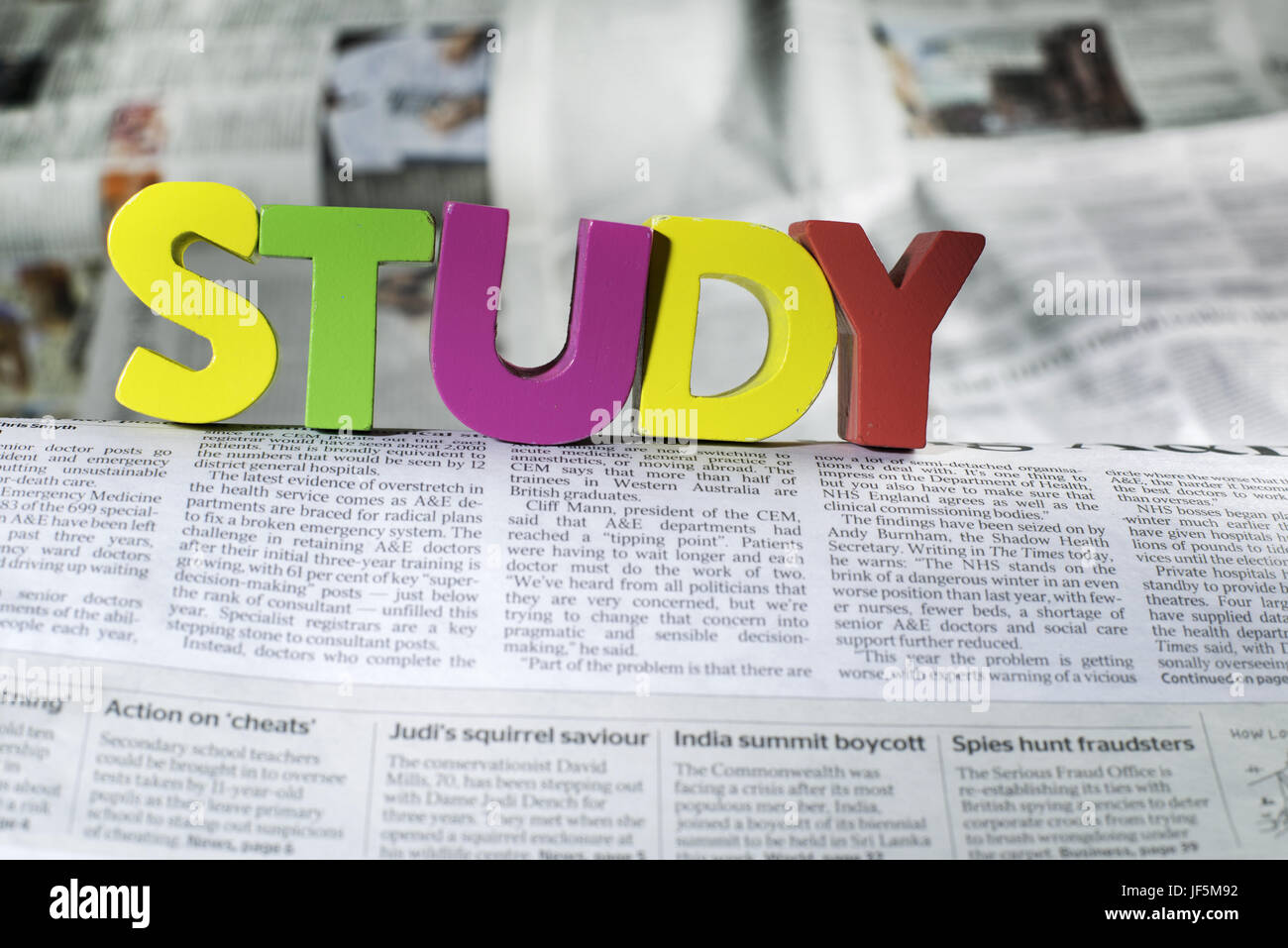 Word study on newspaper page Stock Photo - Alamy