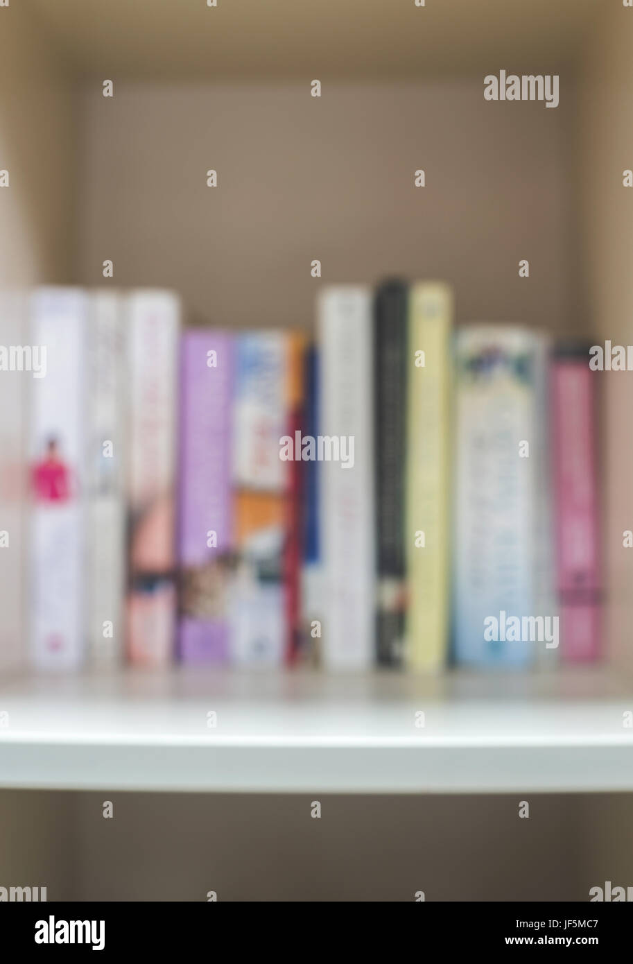 Books on a shelf Stock Photo - Alamy