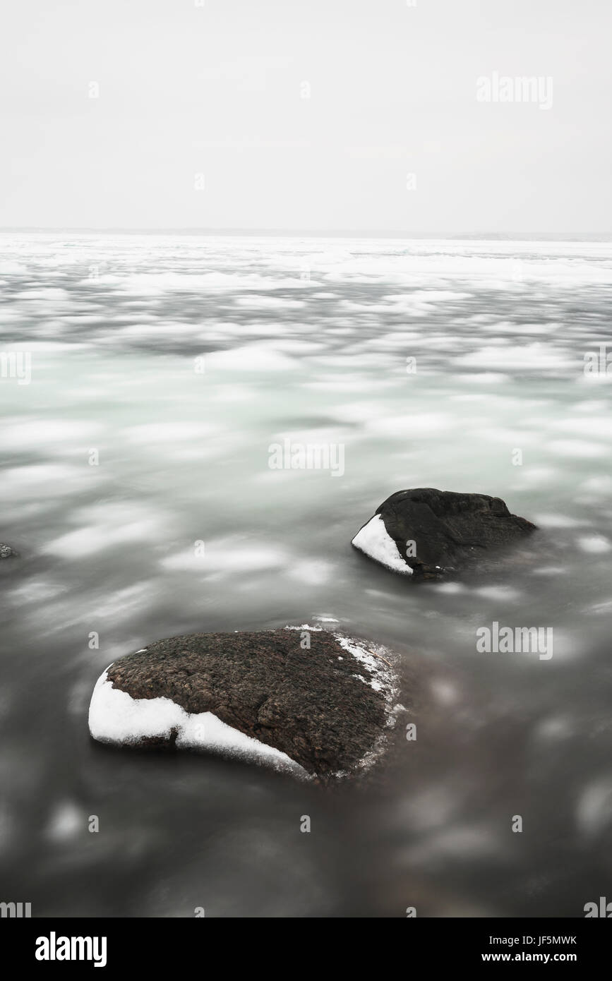 Rocks in sea Stock Photo - Alamy