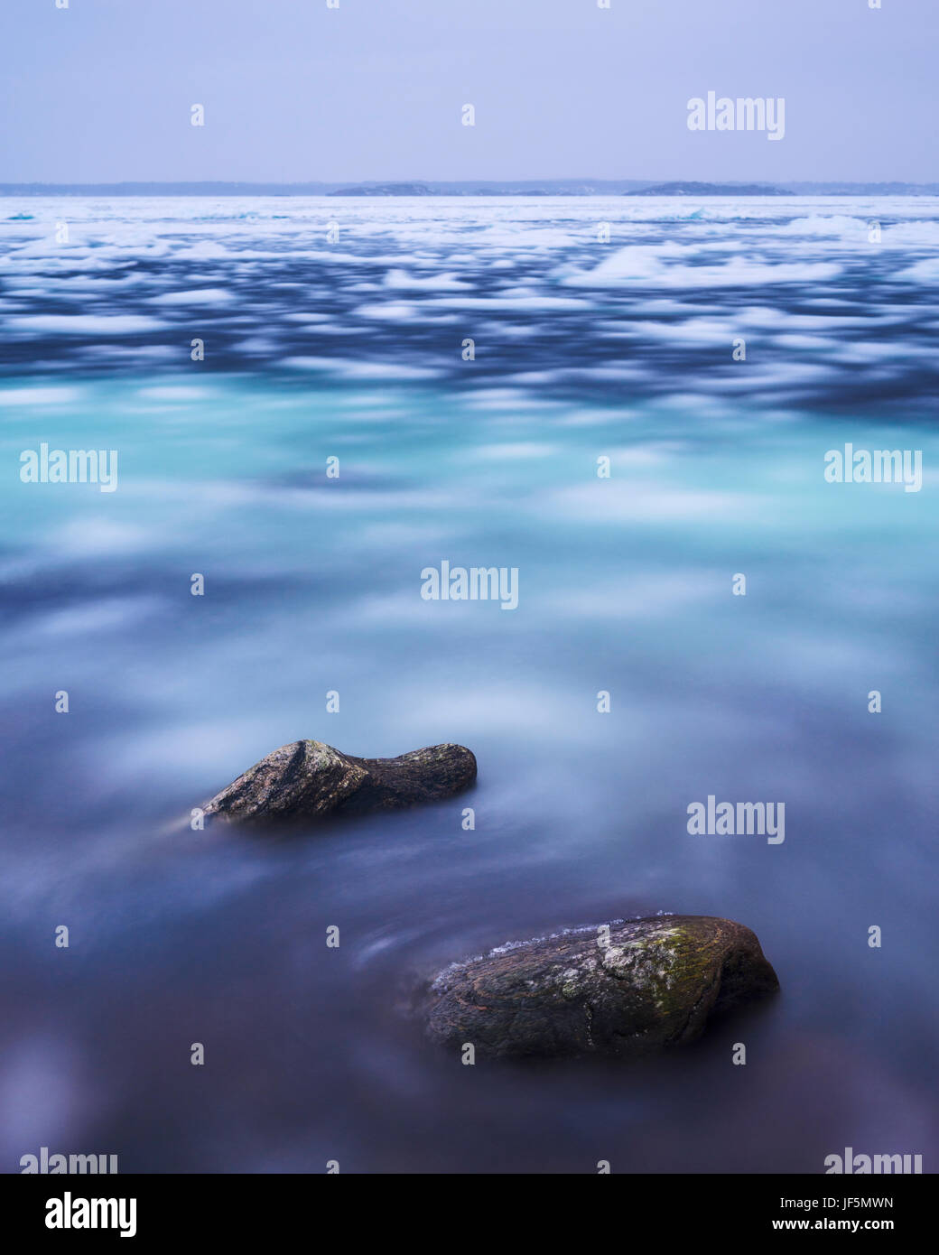 Rocks in sea Stock Photo - Alamy
