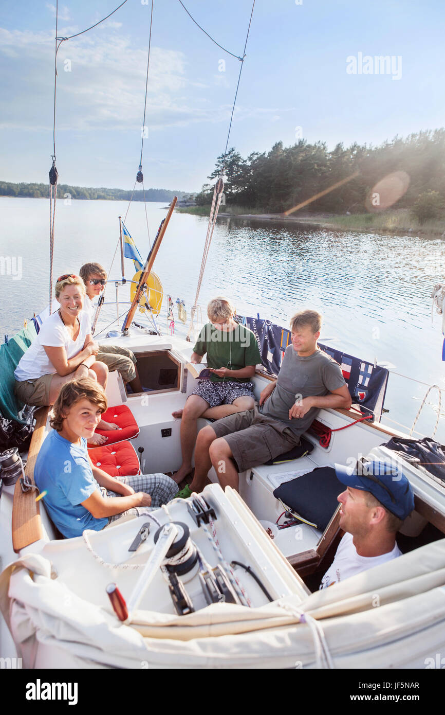 Friends on boat Stock Photo - Alamy