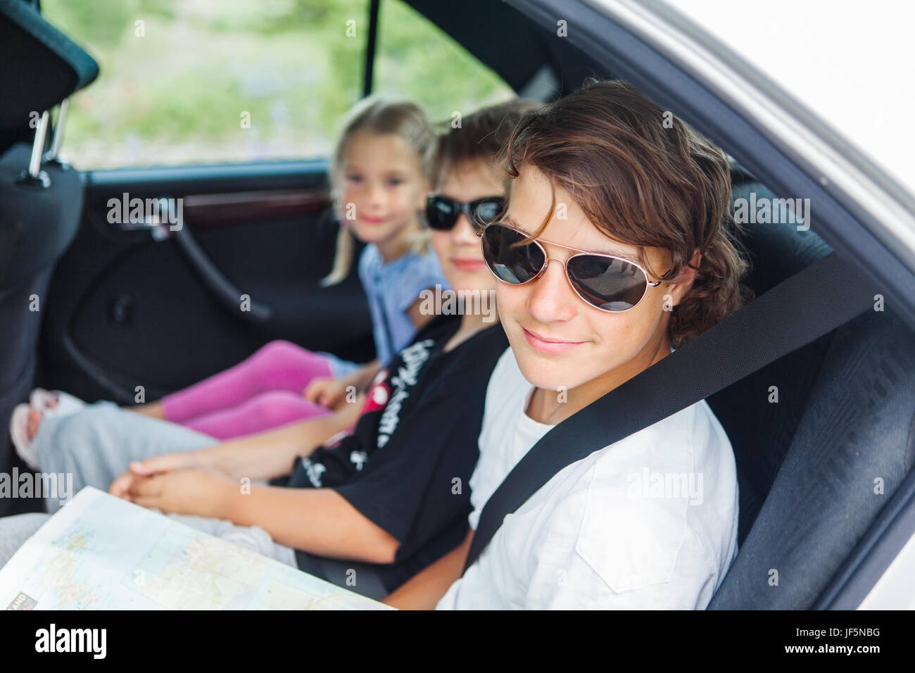 Children in car Stock Photo - Alamy