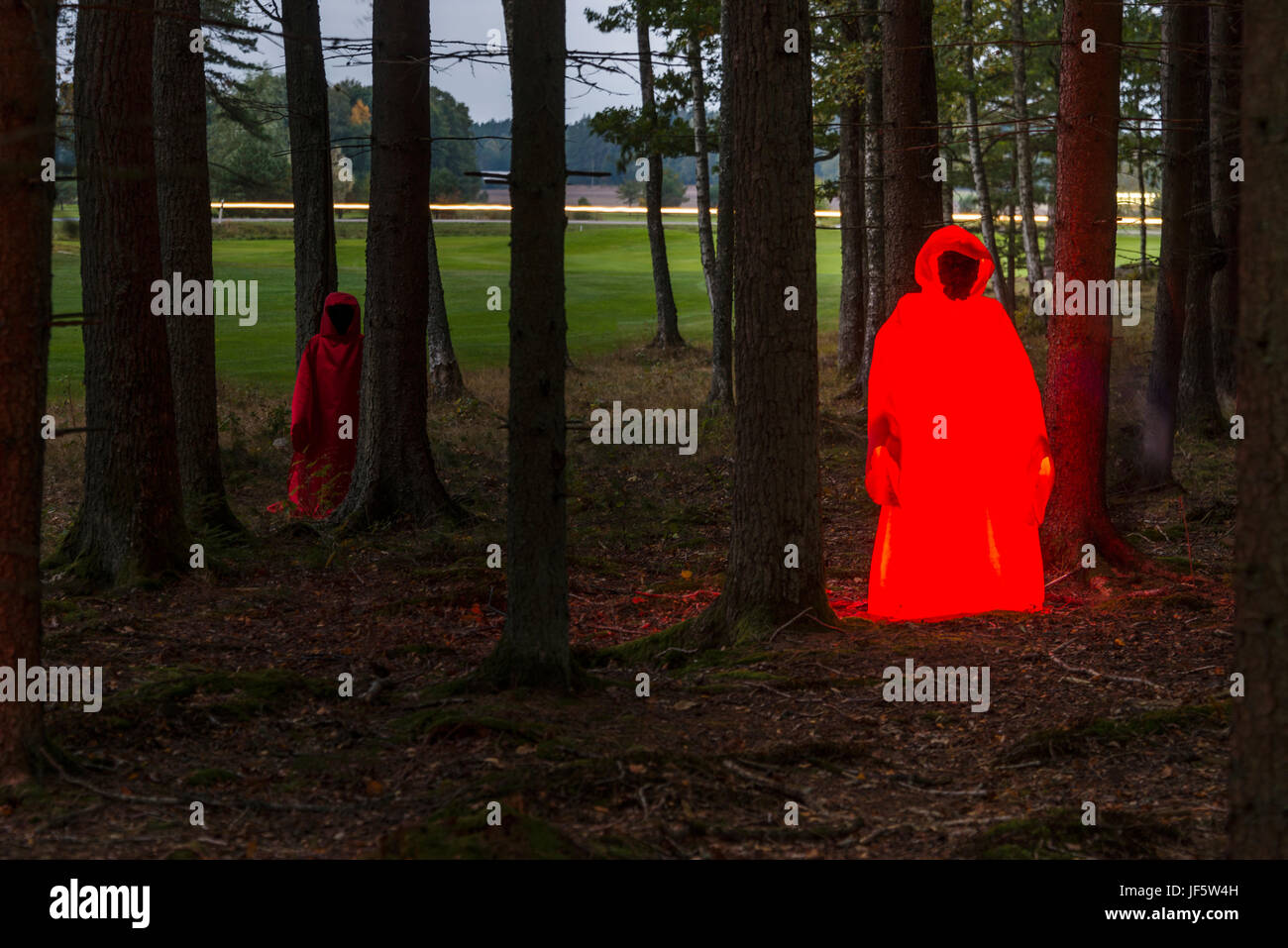 Illuminated red figure in hi-res stock photography and images - Alamy