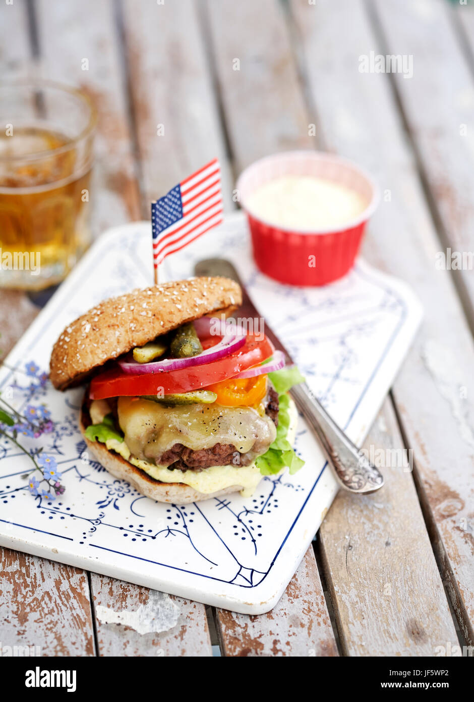 Burger with American flag Stock Photo - Alamy
