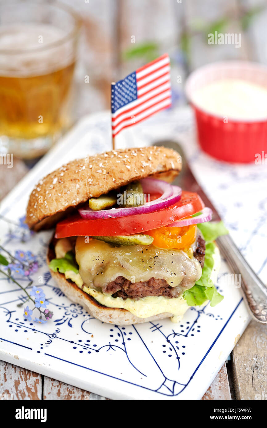 Burger with American flag Stock Photo - Alamy