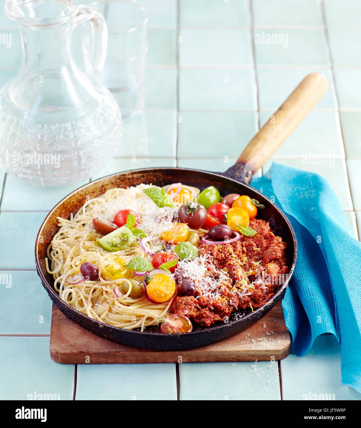 Frying pan with spaghetti Stock Photo - Alamy