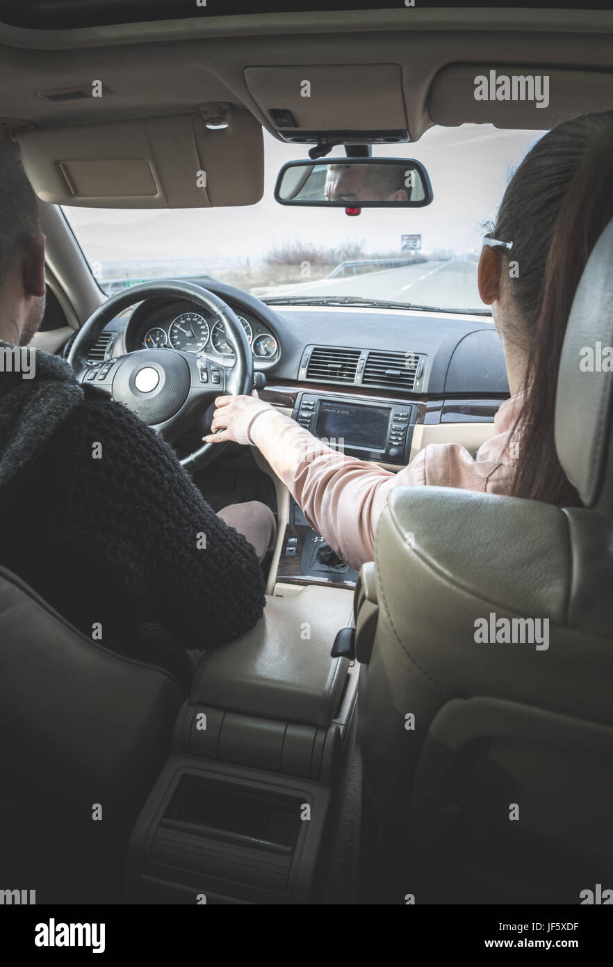 Young boy and girl driving a car Stock Photo - Alamy