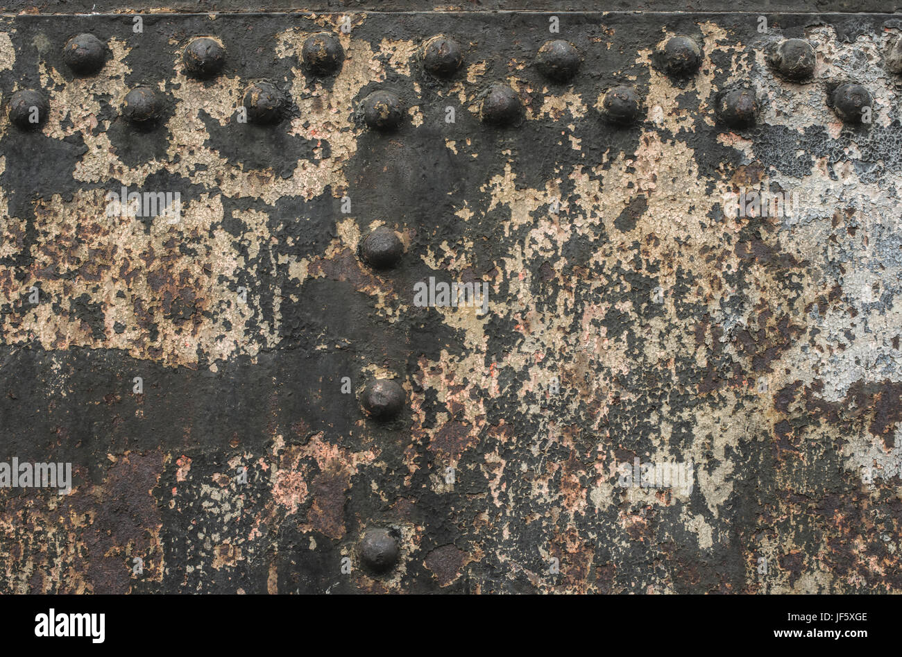 Metal wall with rivets Stock Photo - Alamy