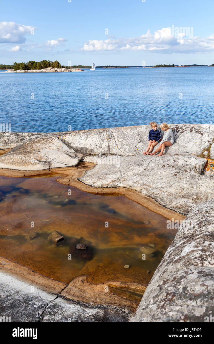 Two boys lying on rock hi-res stock photography and images - Alamy