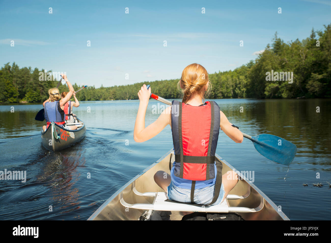 Young girl on kayak Stock Photo - Alamy