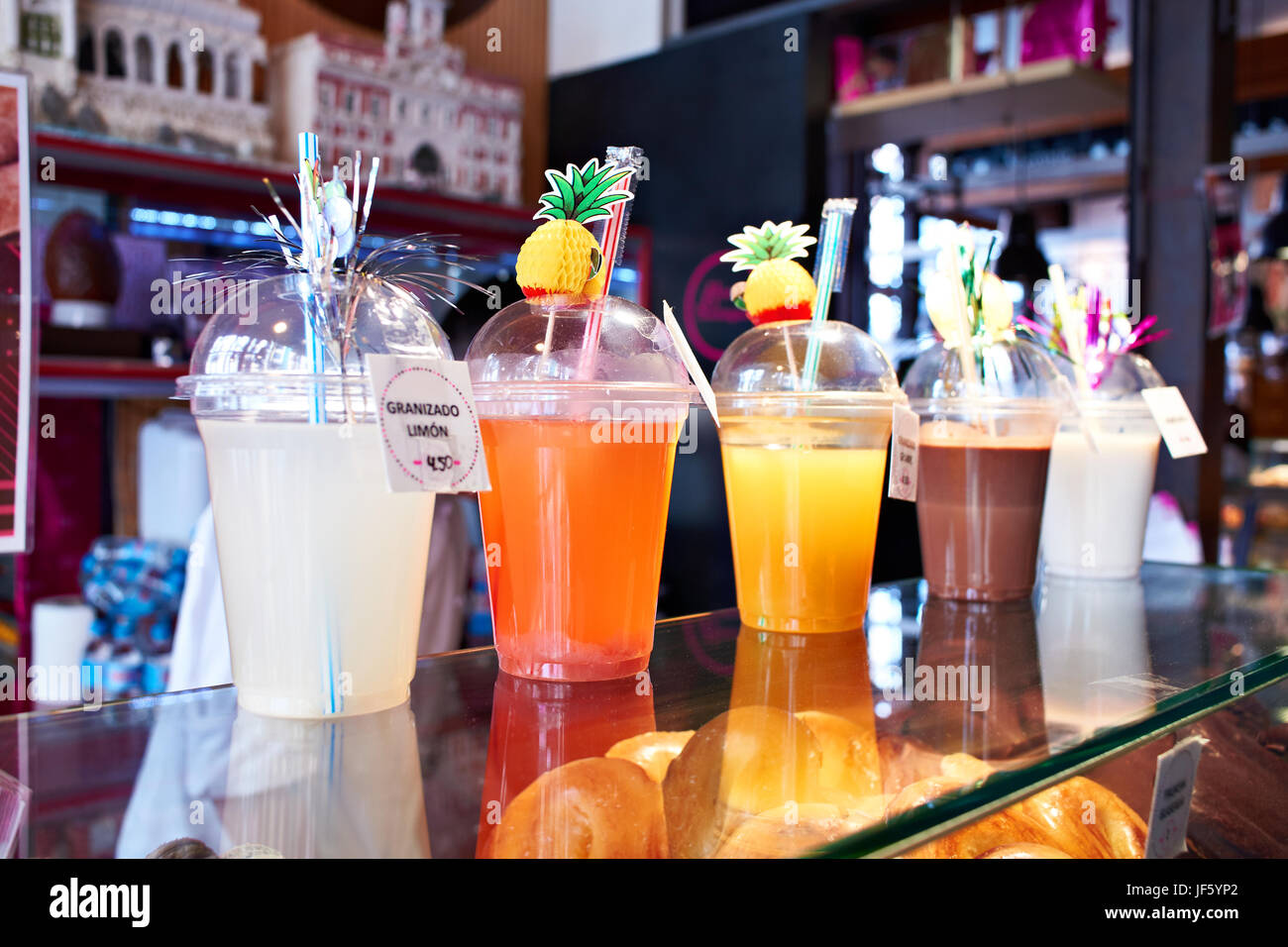 Different fruit and chocolate cocktails on the counter of the store ...