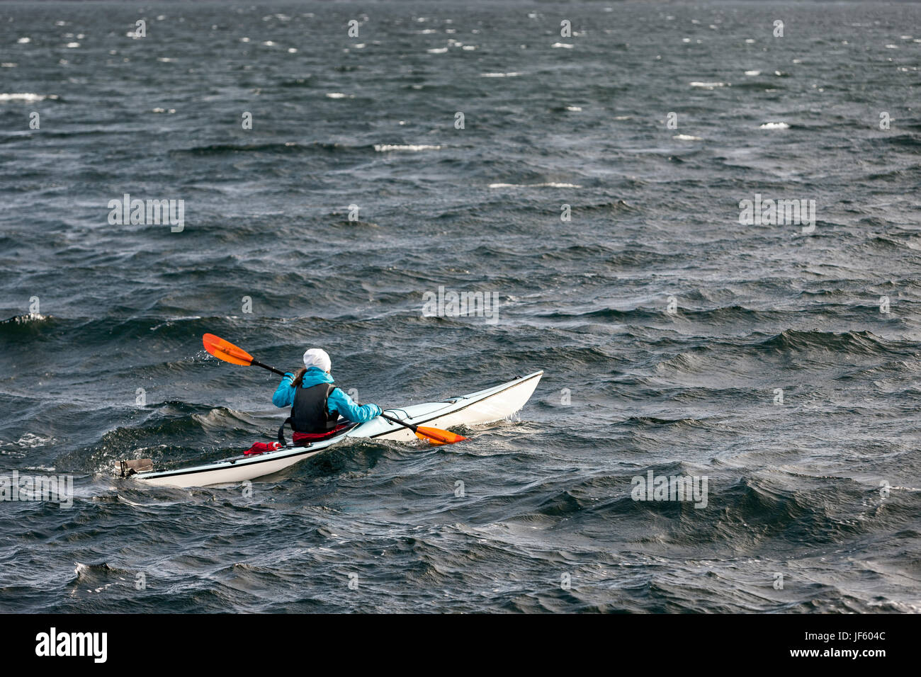 Person kayaking on sea Stock Photo - Alamy