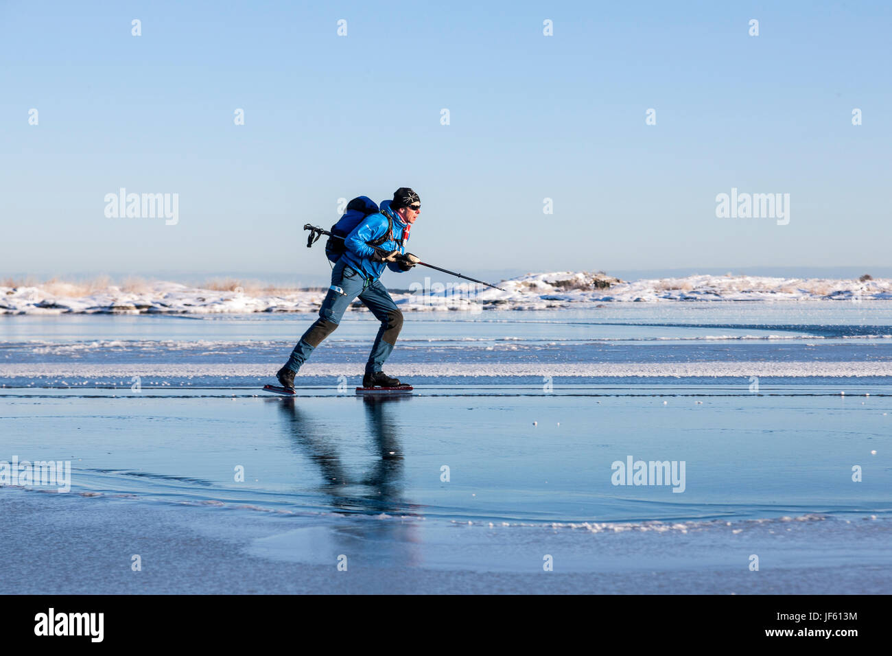 Man long-distance skating Stock Photo - Alamy
