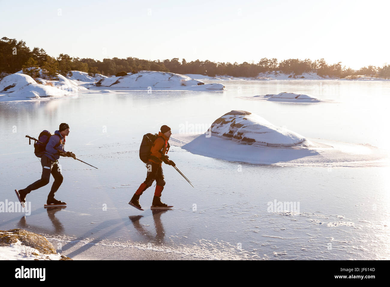 Men long-distance skating Stock Photo - Alamy